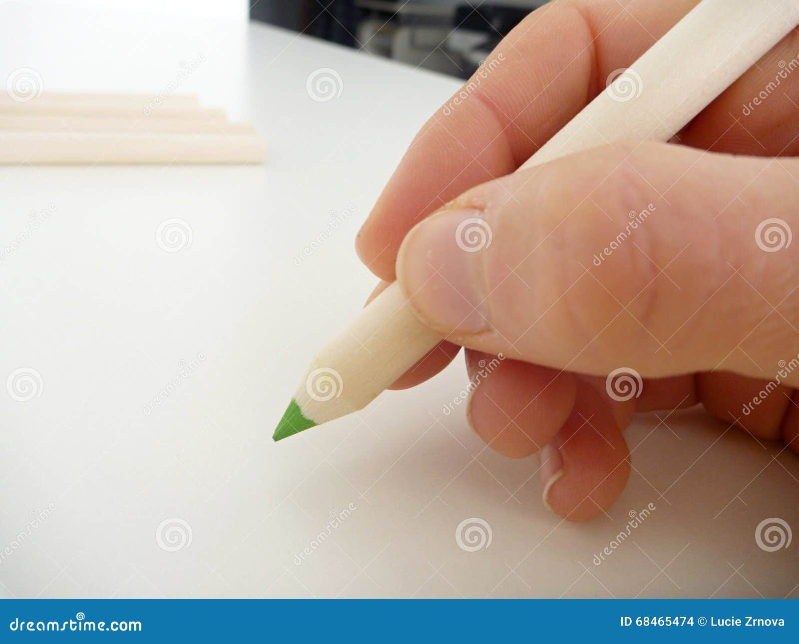 Green Pencil in a Hand Writing Stock Photo - Image of hand, colorful ...