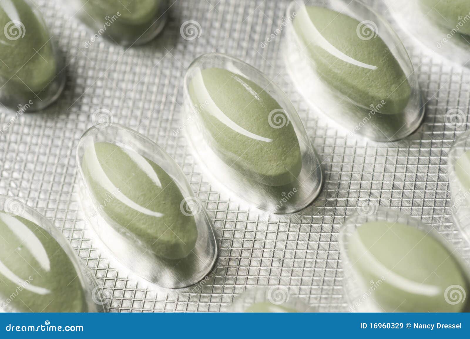 Green pills closeup stock image. Image of dope, green - 16960329
