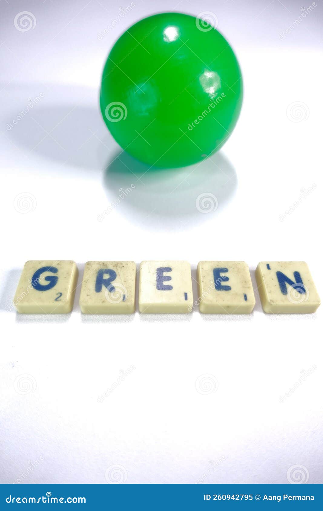 Green Plastic Ball with Plastic Cube with Letters . Stock Image - Image ...