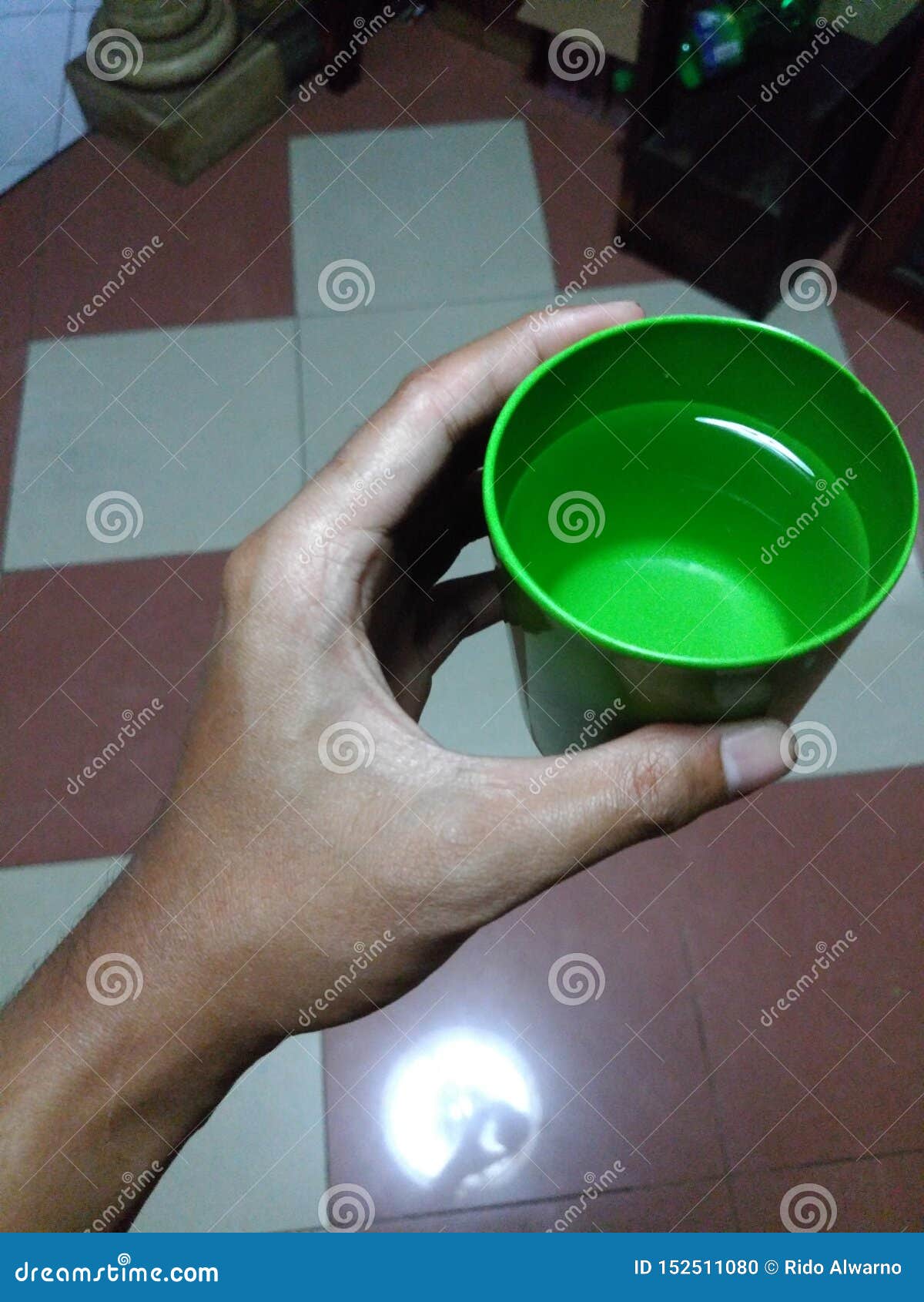 Plastic cup hold by hand stock photo. Image of plastic - 152511080