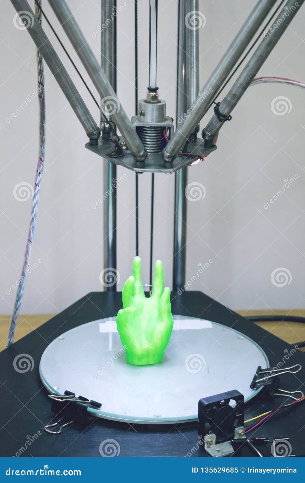 Green Plastic 3D Printed Human Hand Stands in Three-dimensional Printer ...