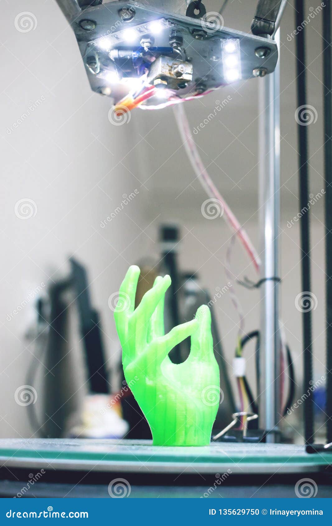 Green Plastic 3D Printed Human Hand Stands in Three-dimensional Printer ...