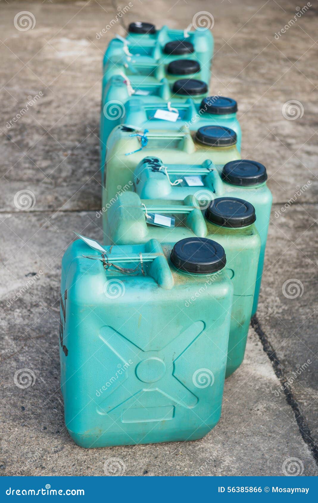Green plastic fuel tanks stock photo. Image of liquid - 56385866