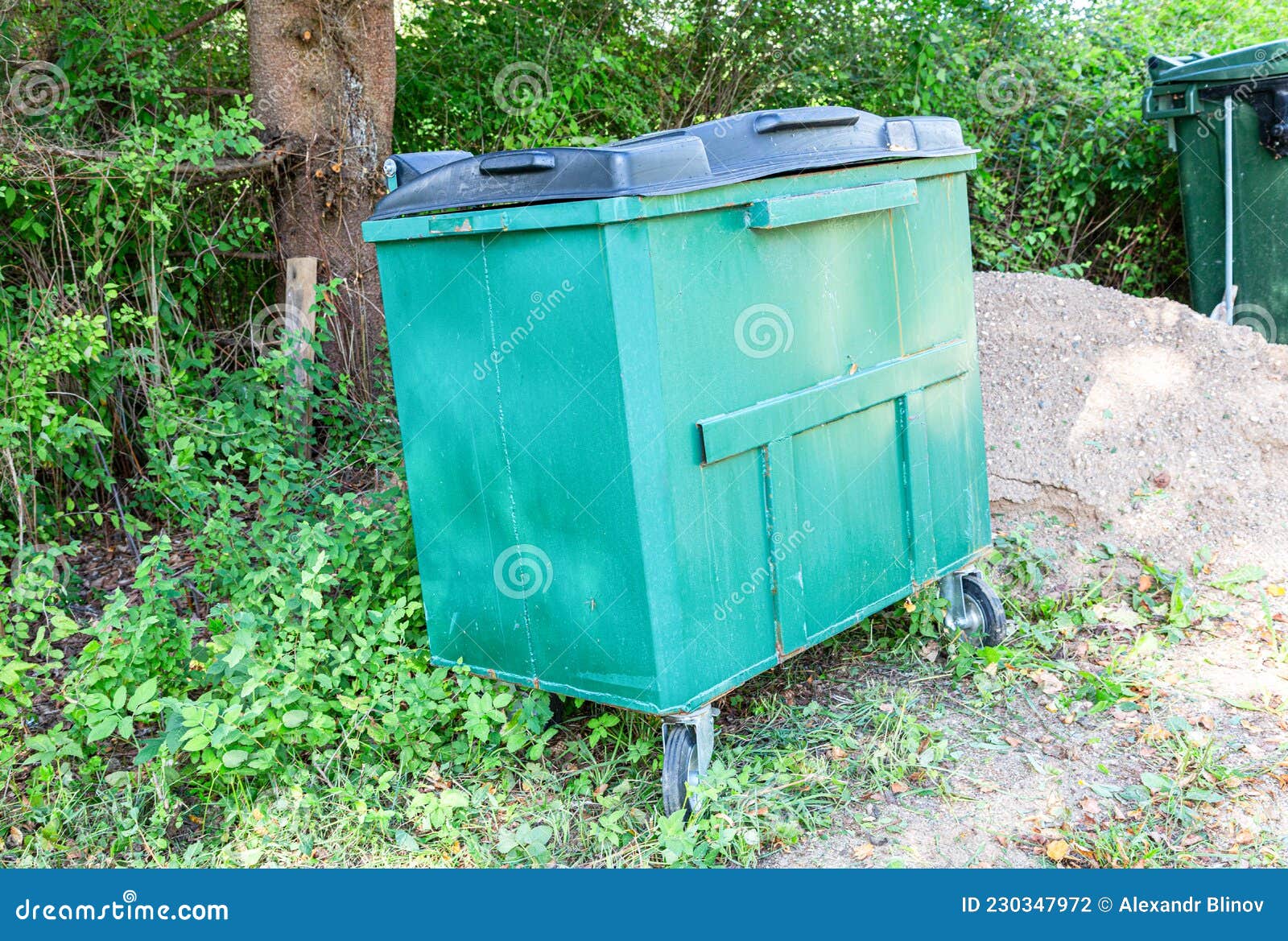 Green Plastic Garbage Container Stock Photo - Image of refuse, rubbish ...