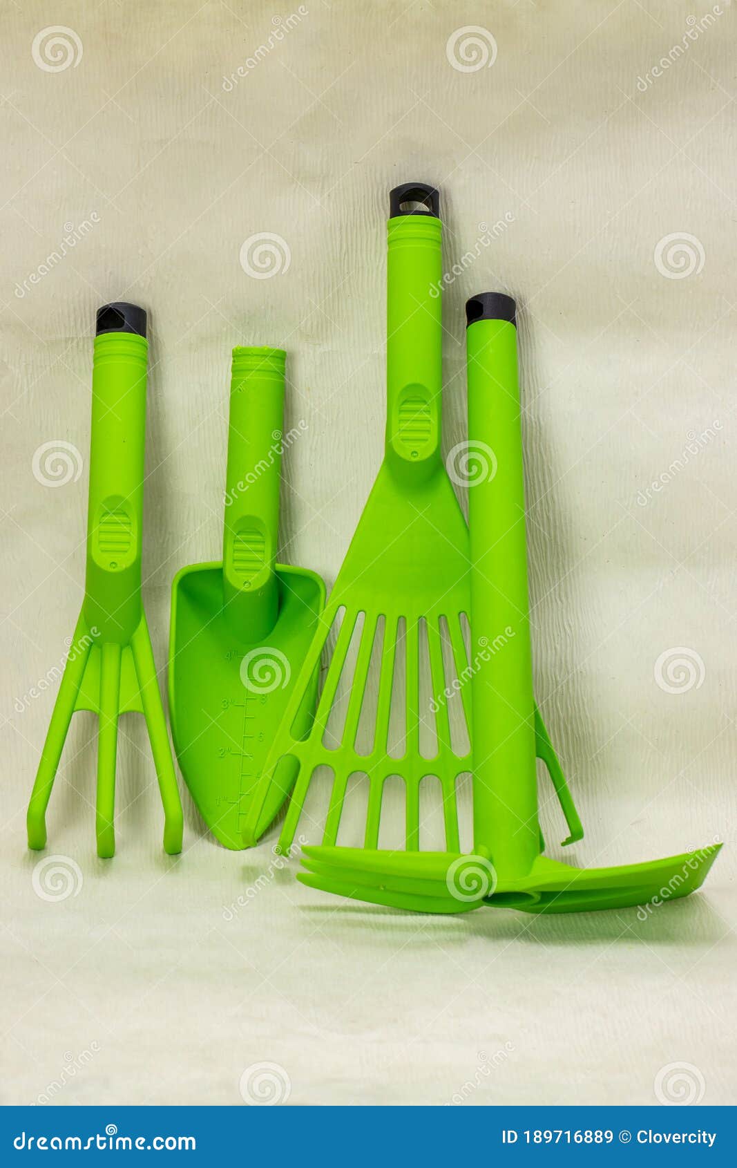 Green Plastic Garden Tools stock image. Image of glove - 189716889