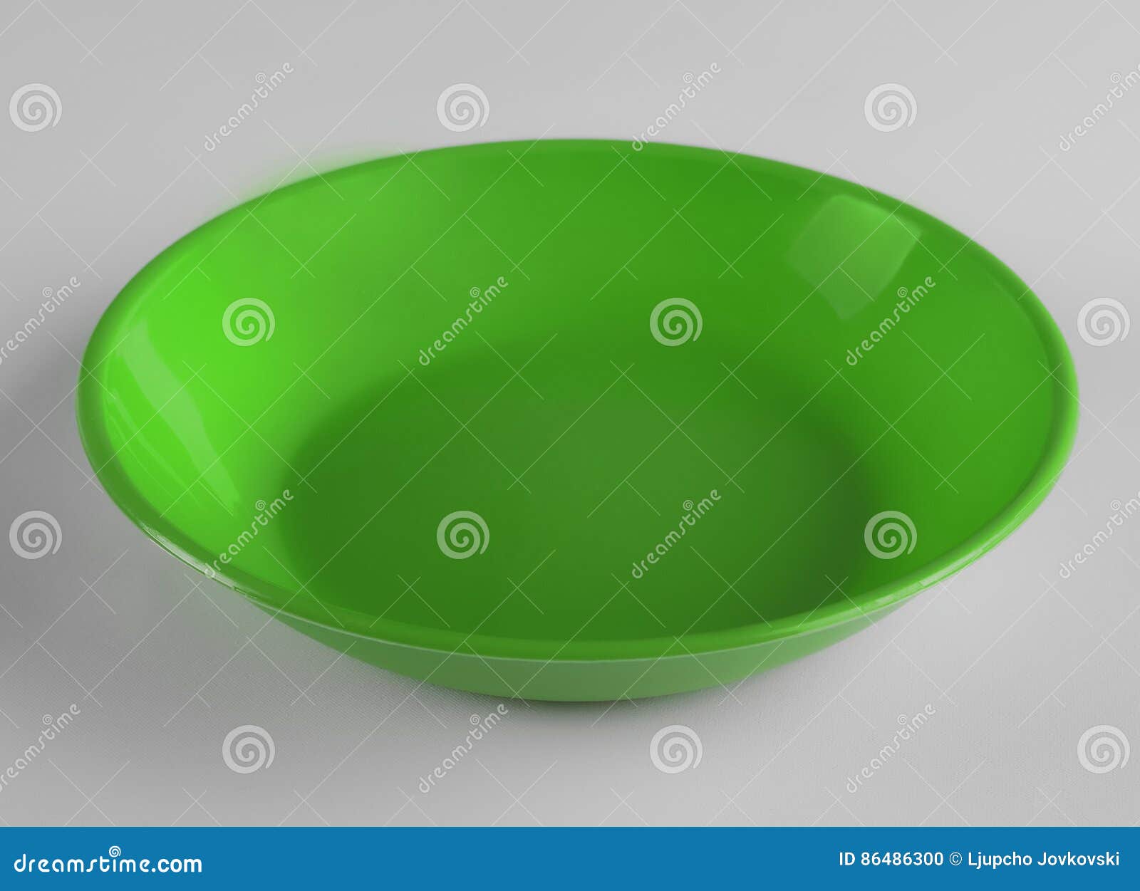 Green plastic shallow dish stock photo. Image of dish - 86486300