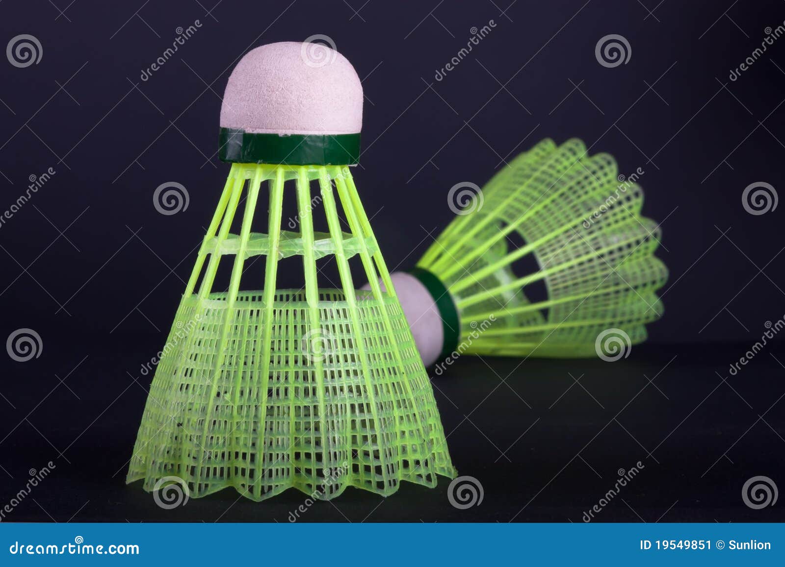 Green plastic shuttlecocks stock image. Image of background - 19549851