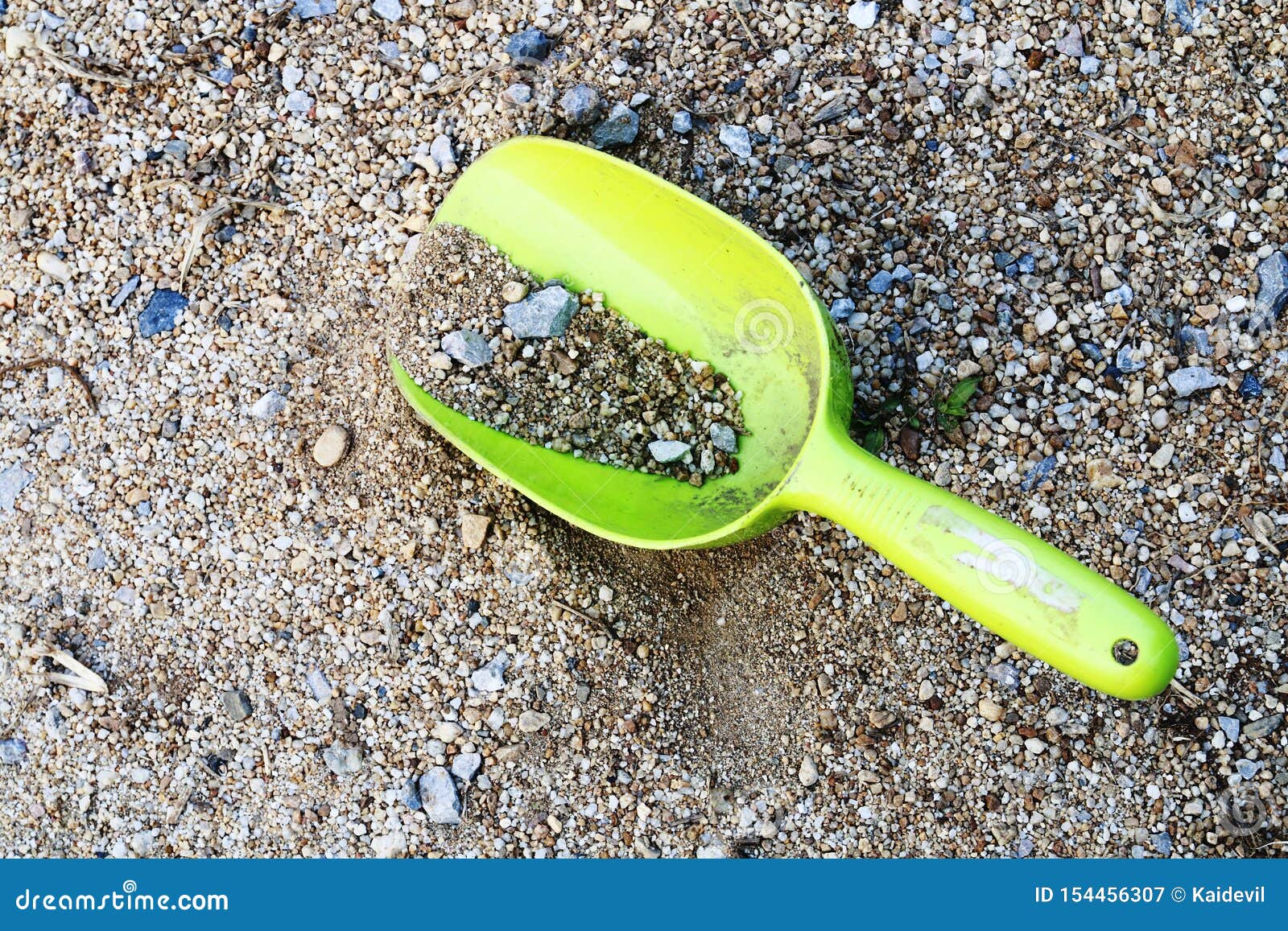 Green Plastic Spade on the Sand Stock Image - Image of plastic, spade ...