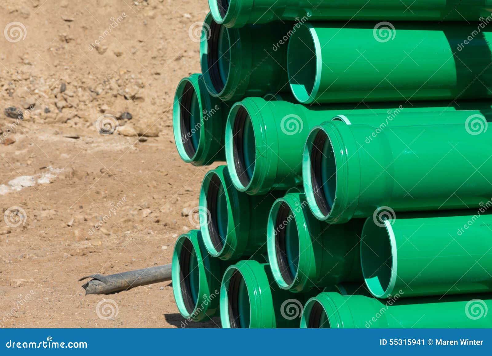 Green Plastic Tubes on a Construction Site Stock Image - Image of ...