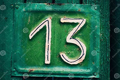 Green plate with number 13 stock photo. Image of focus - 11206150