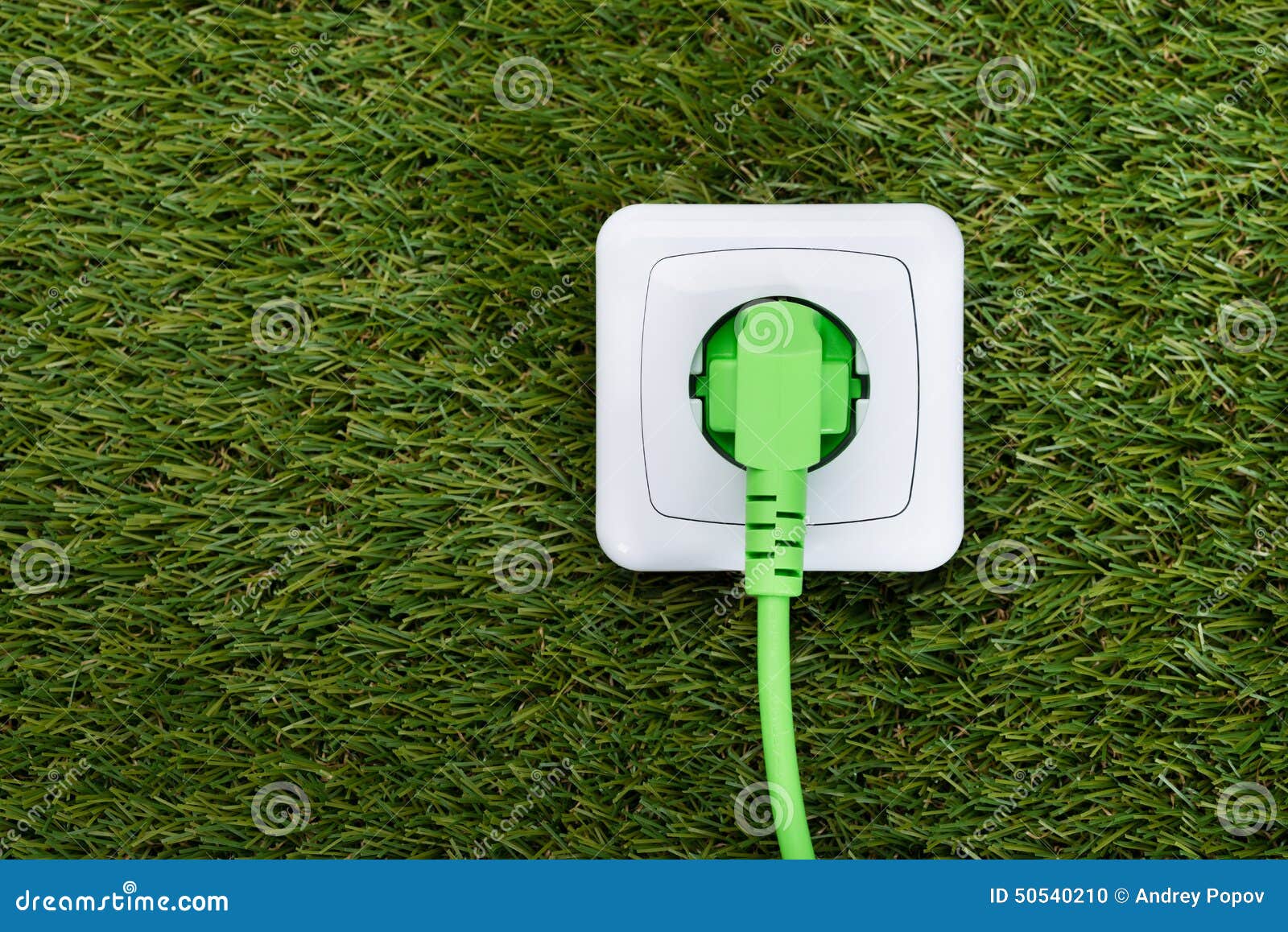 Green Plug in Outlet on Grass Stock Photo - Image of efficiency, grass ...