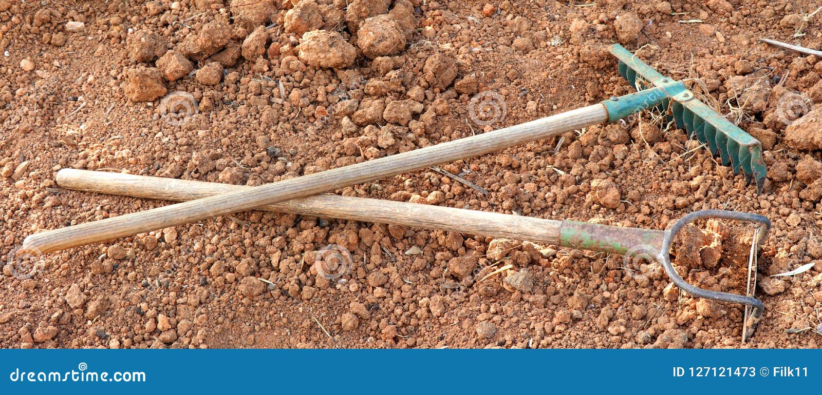 Green Rake and Hoe on the Brown Soil. Stock Image - Image of cultivate ...