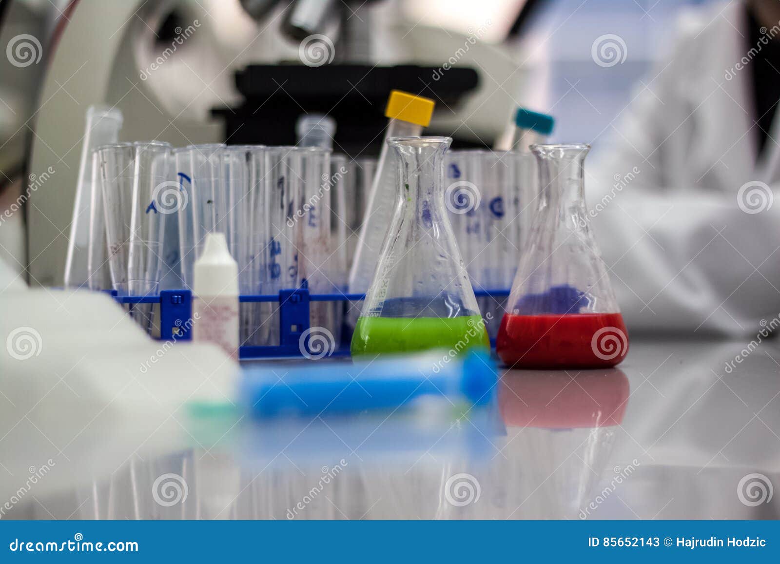 Microscope And Test Tubes On Table. Educational Experiment Concept. Be ...