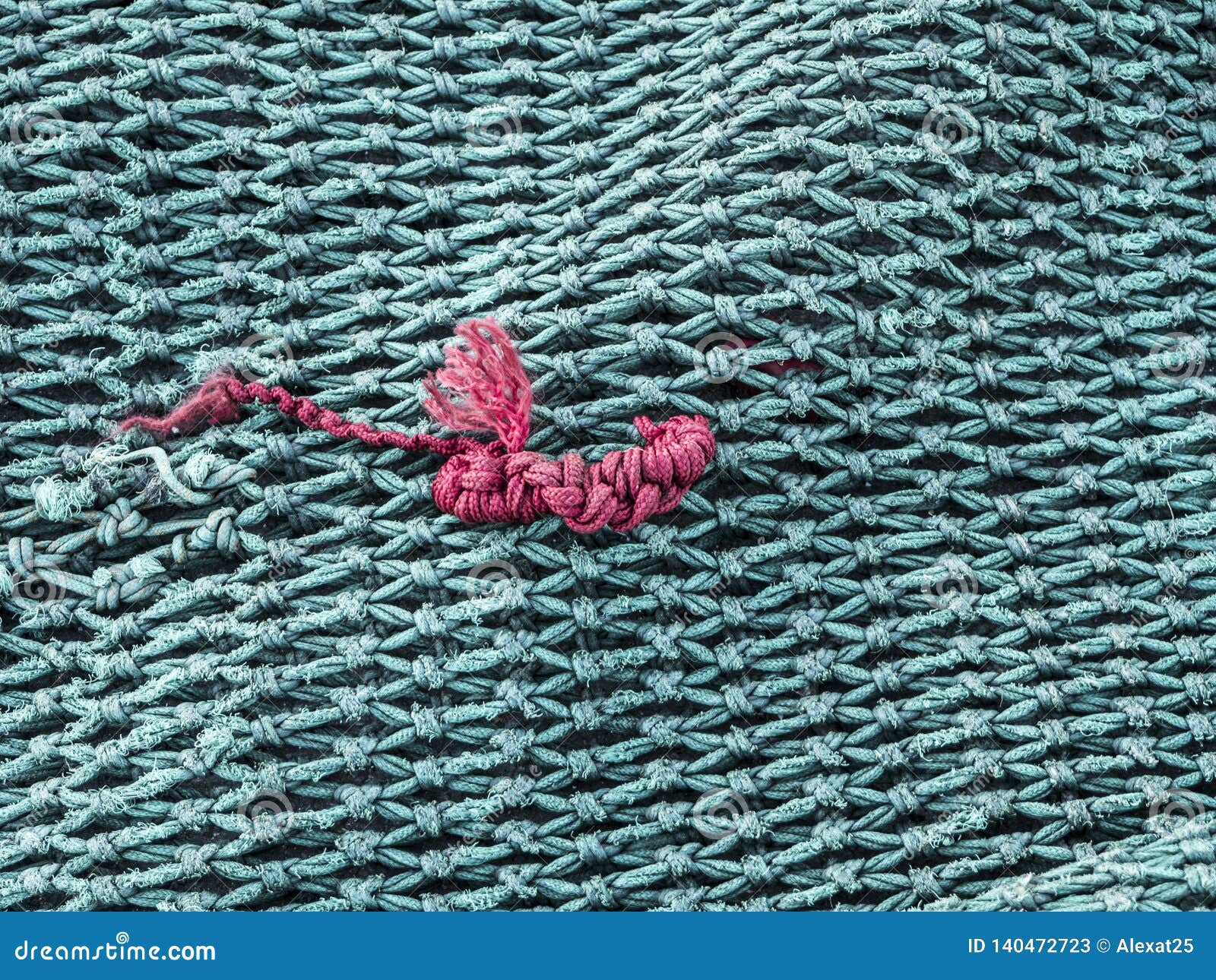 Green and red fishnet stock image. Image of equipment - 140472723