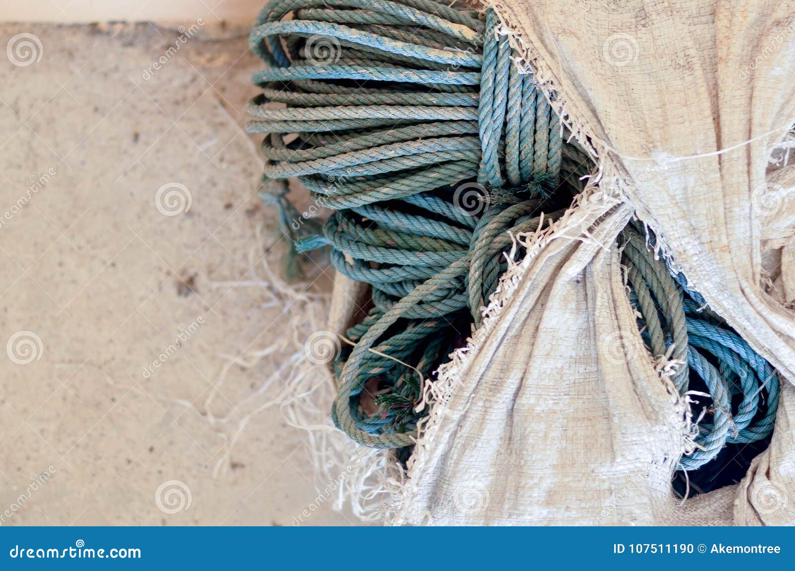 Green rope in broken bag stock photo. Image of boat - 107511190