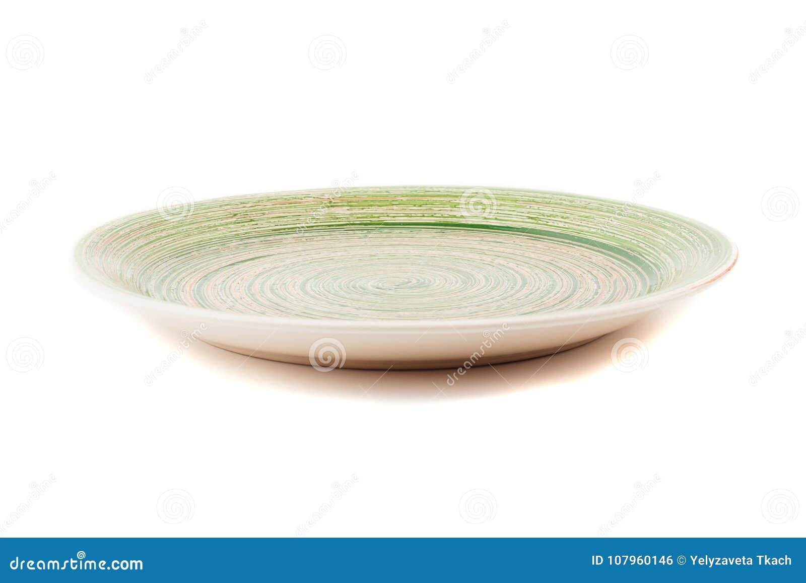 Green Round Ceramic Plate with Spiral Pattern, Isolated on White Stock ...