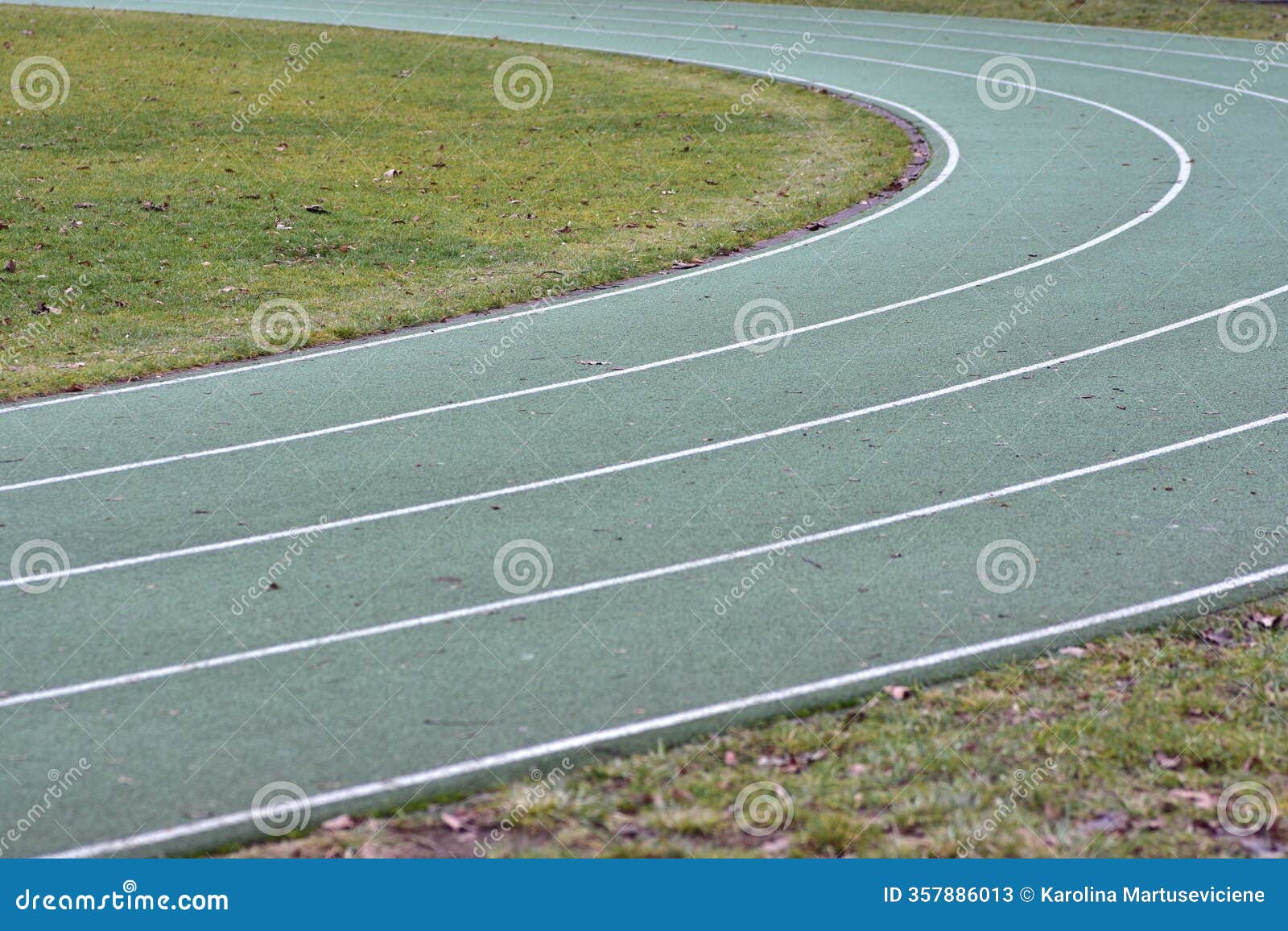 Green Running Track Curve with White Lines and Green Grass Stock Image ...