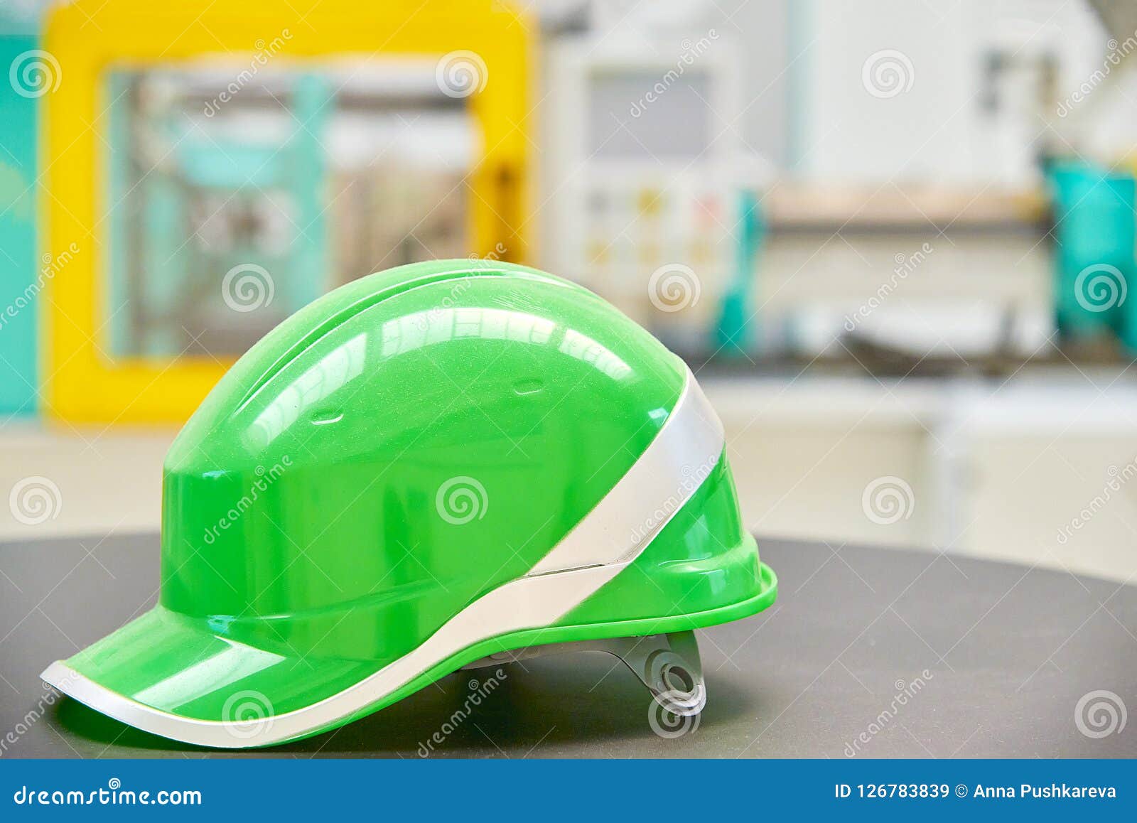 Green Safety Helmet on Industrial Background. Stock Image - Image of ...