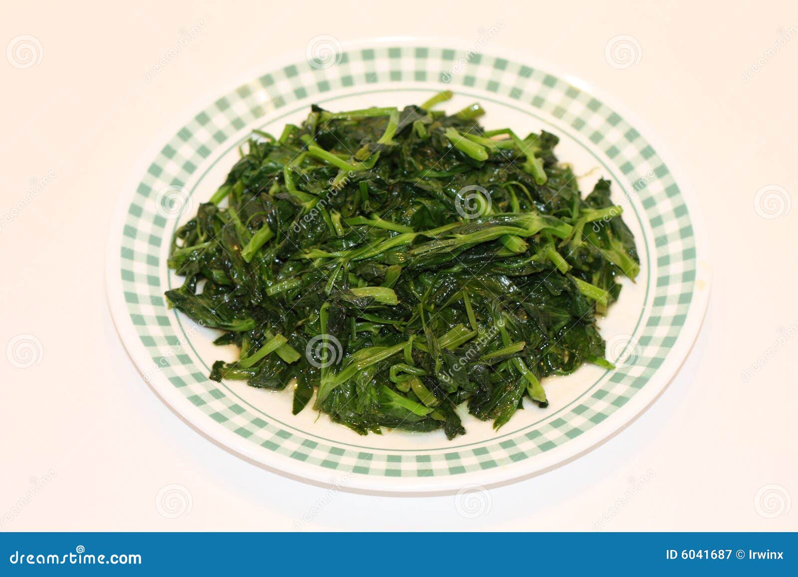 Green Sauteed Spinach on Plate Stock Image - Image of closeup ...