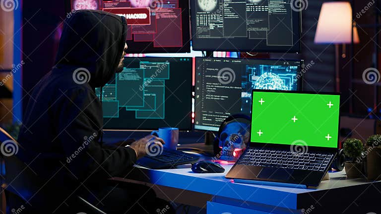 Green Screen Laptop Used by Hacker in Underground Hideout To Write Lines of Code Stock Photo ...
