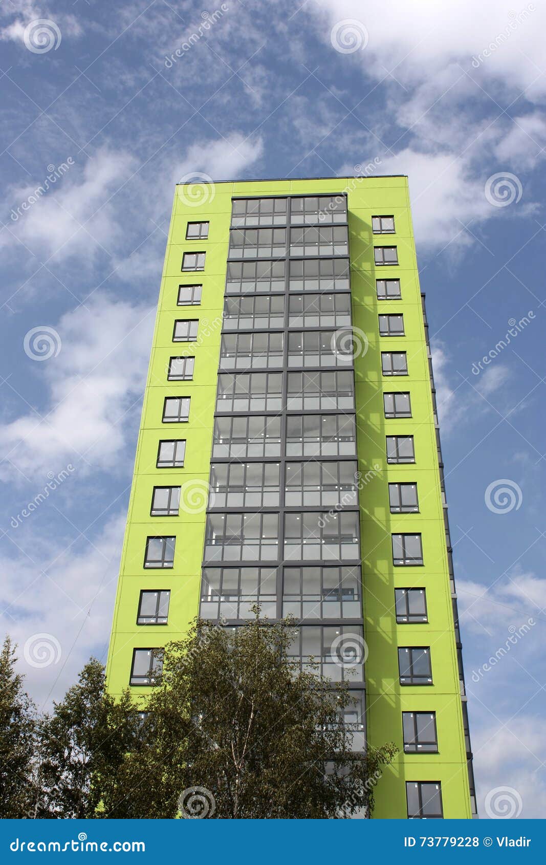 Green Skyscraper Against of Clouds Stock Photo - Image of tower, green ...