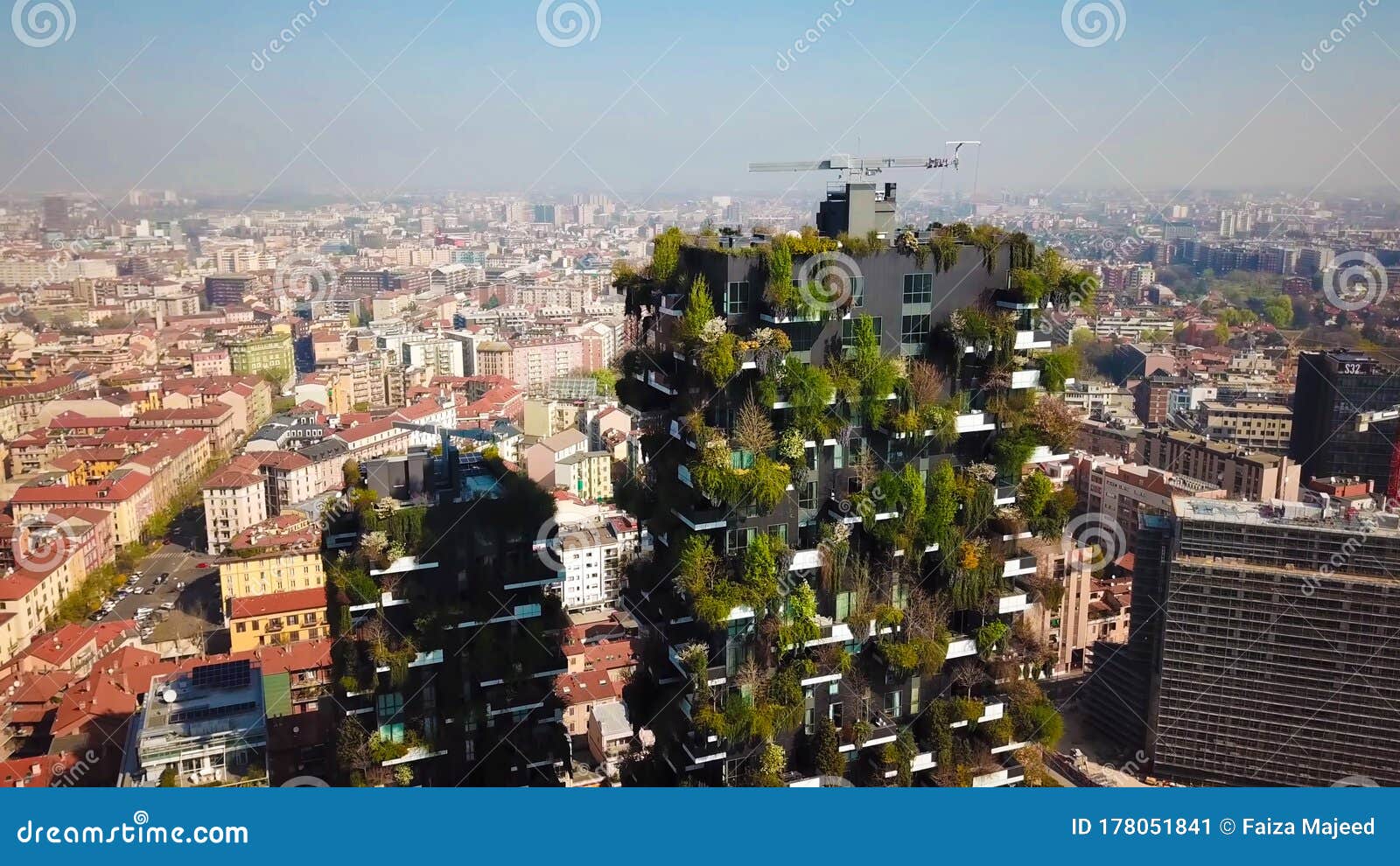 Green Skyscraper Building with Plants Growing on the Facade Stock Image ...