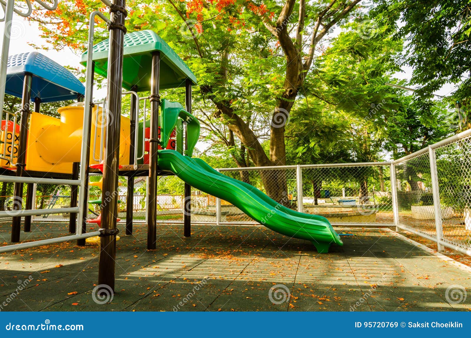 Green slide in playground stock image. Image of outdoor - 95720769