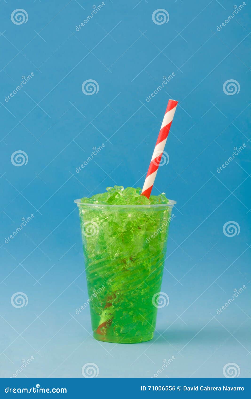 Green Slushie And Blue Background Stock Photo | CartoonDealer.com #71006556