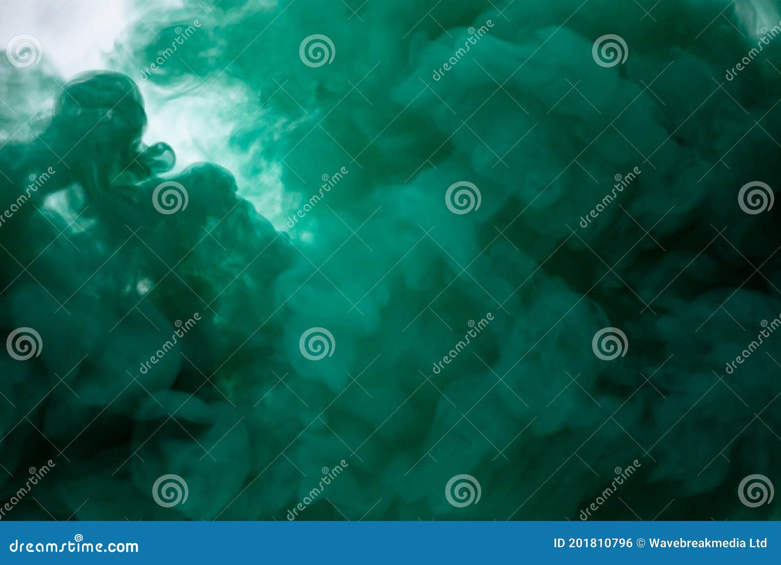Green Smoke Bomb Exploding Against White Background Stock Photo - Image ...