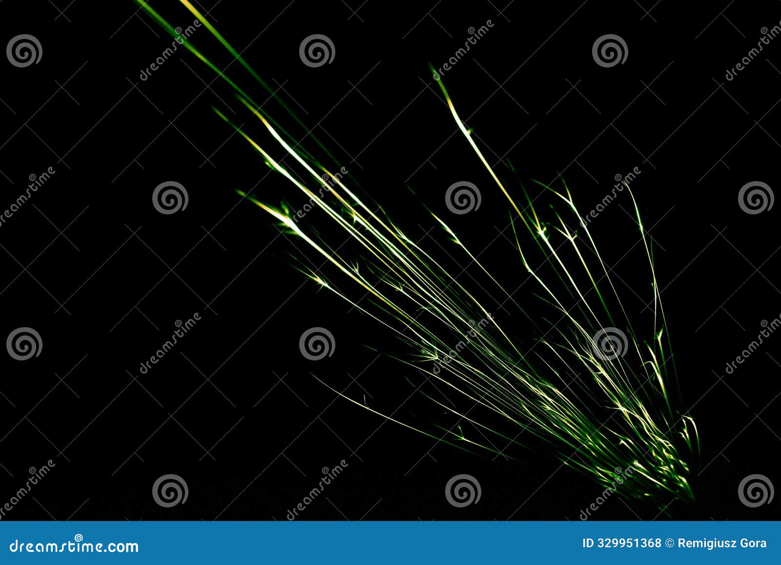 Green Sparks from the Grinder Glowing in the Dark Stock Photo - Image ...
