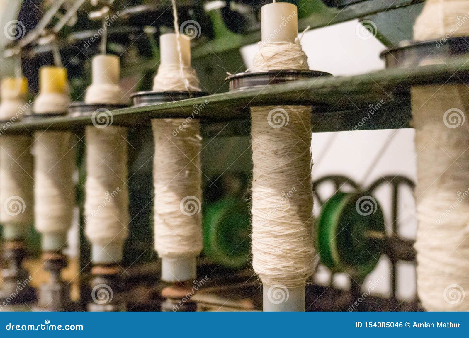 Green Spindle Weaving Machine Used To Make Cloth Stock Photo - Image of ...