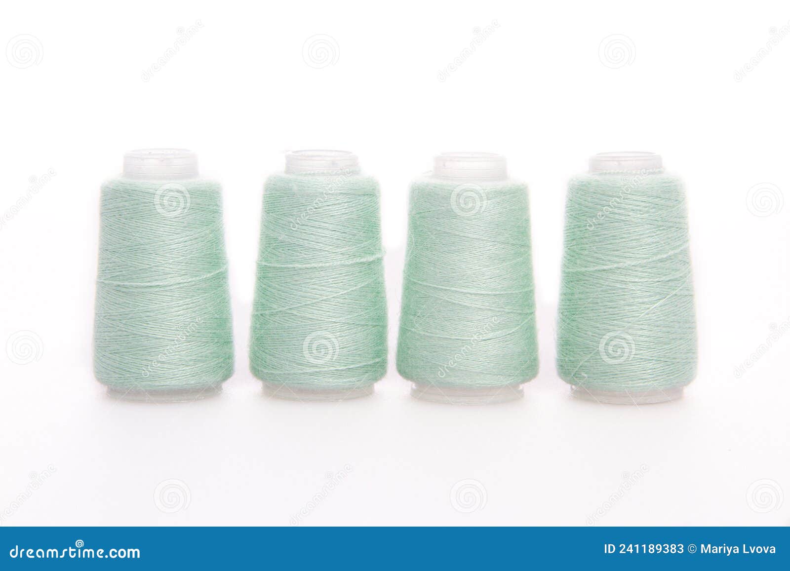 Green Spool of Thread Isolated on White Background. Skein of Woolen ...