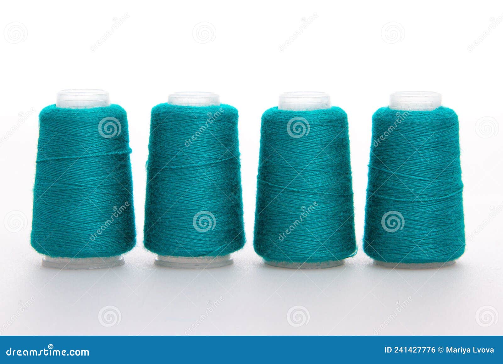 Green Spool of Thread Isolated on White Background. Skein of Woolen ...