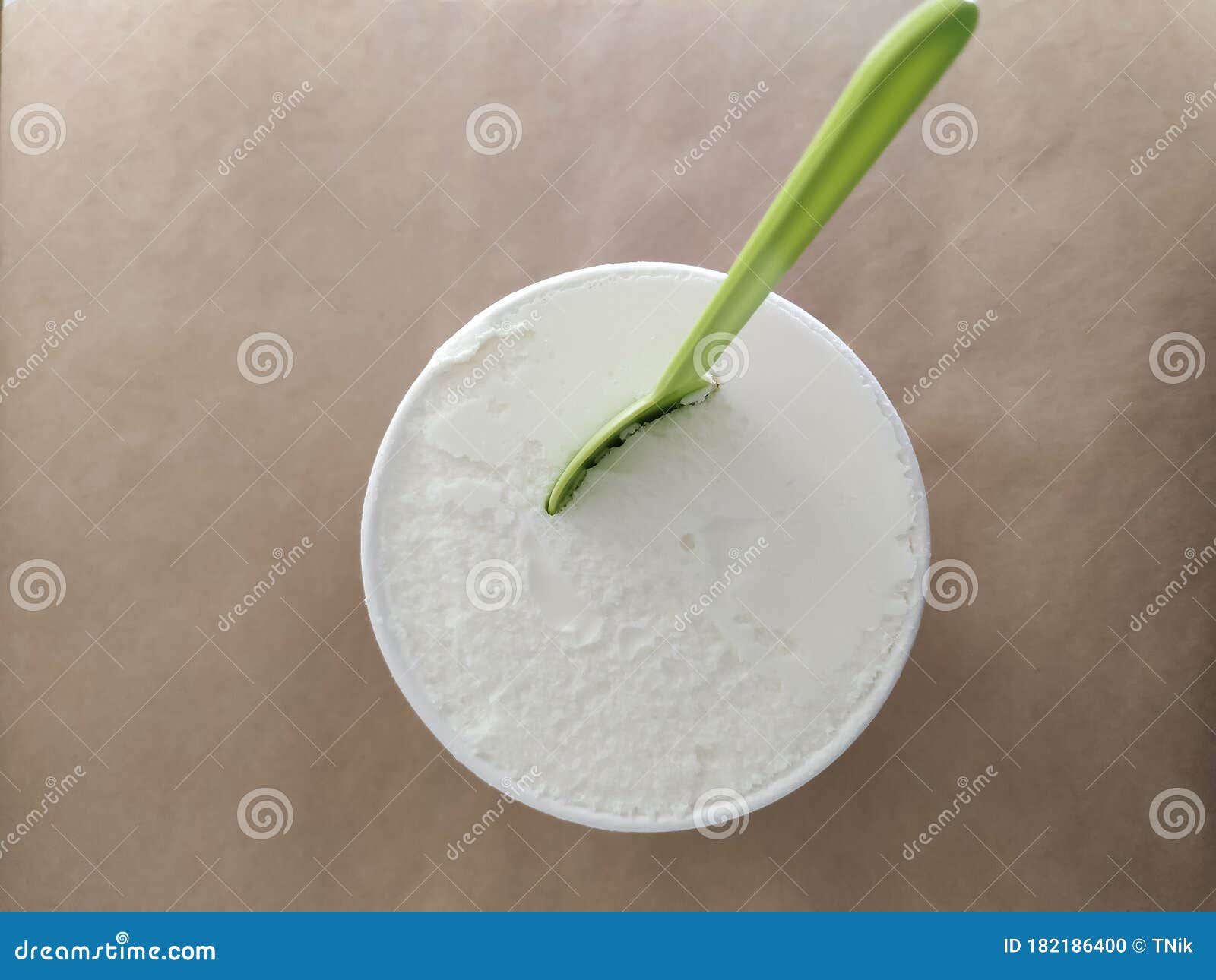Green Spoon in Vanilla Ice Cream Stock Photo - Image of icing, dessert ...
