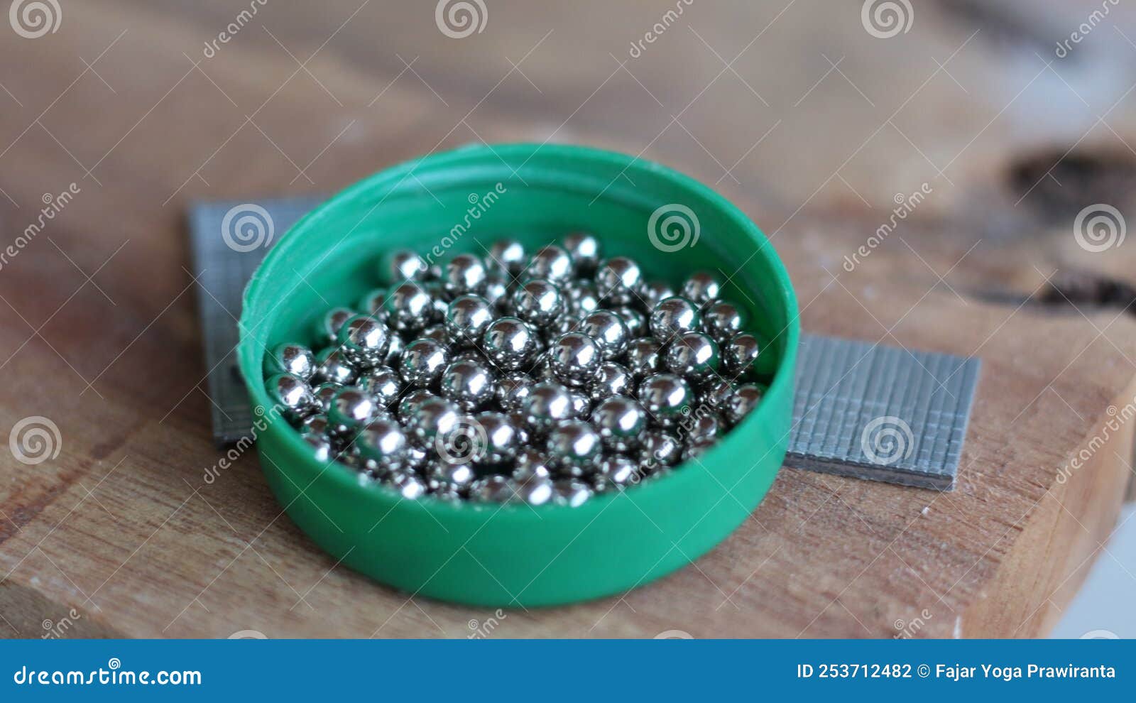 Green and Stainless Round Plastic Bullets - Okee Stock Photo - Image of ...