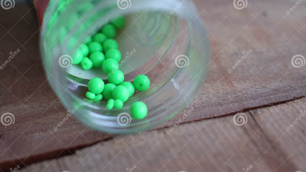 Green and Stainless Round Plastic Bullets - Okeeee Stock Photo - Image ...