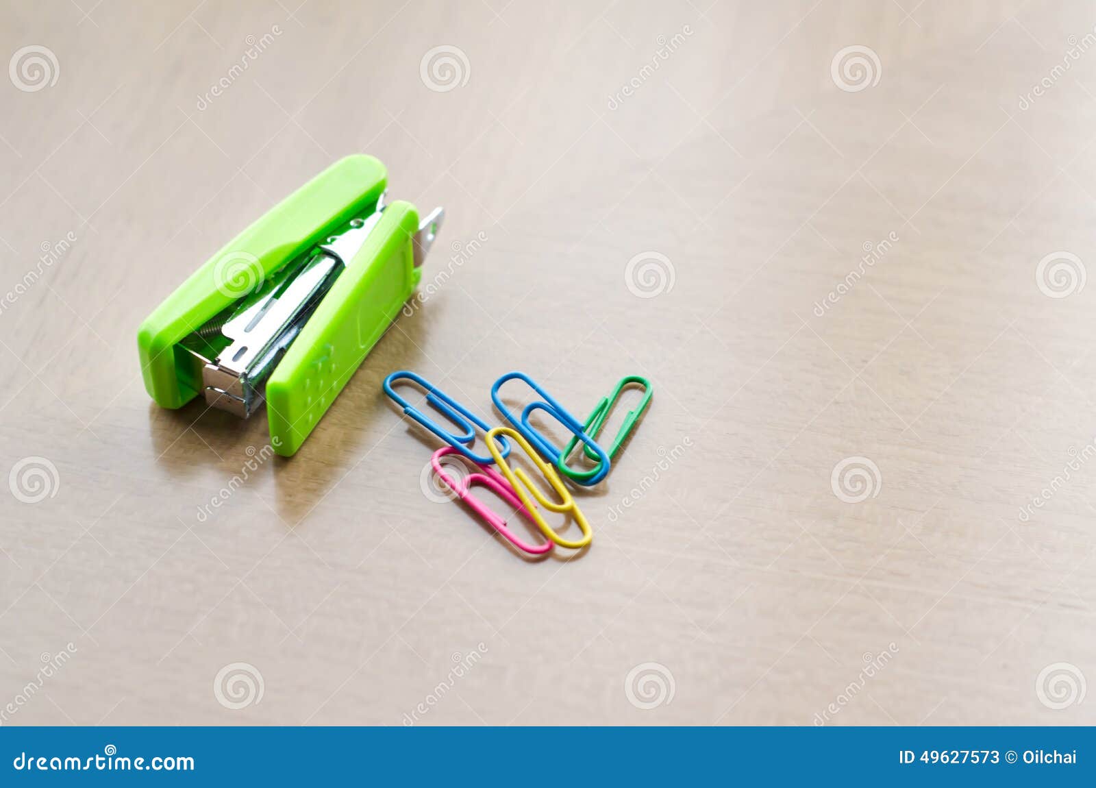 Green Stapler and Paper Clip Stock Image - Image of handy, iron: 49627573