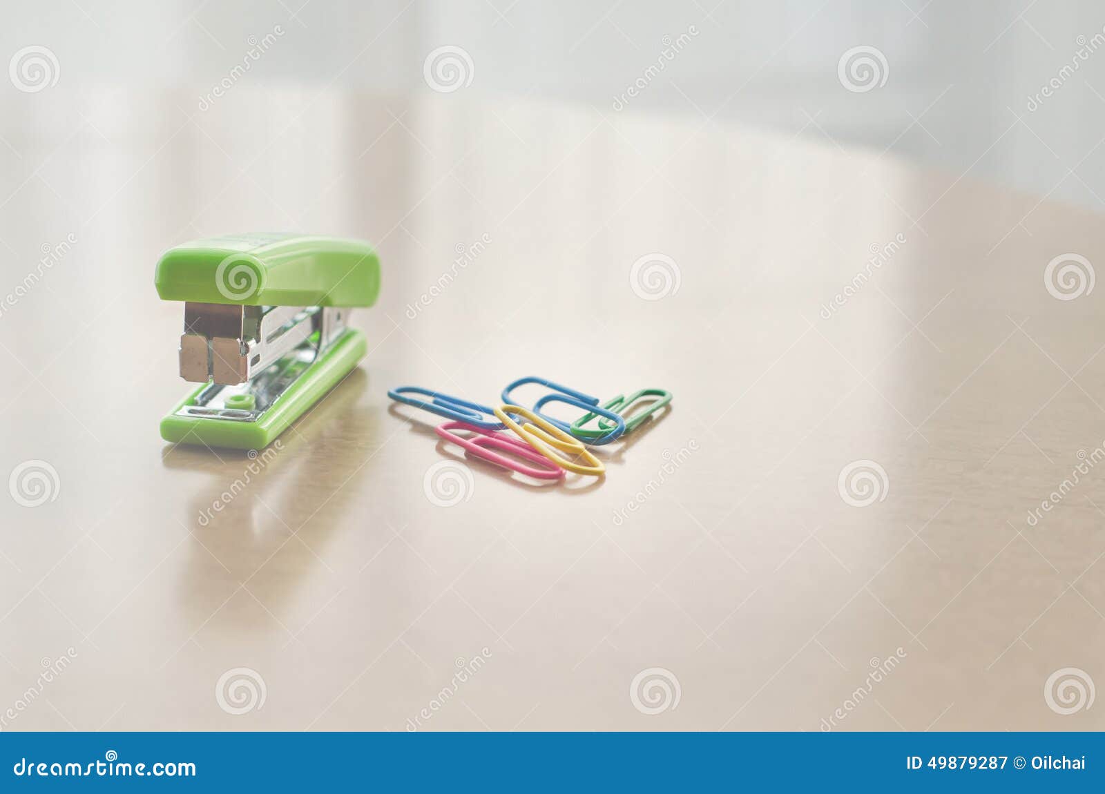 Green Stapler and Paper Clip Stock Image - Image of closeup, steel ...