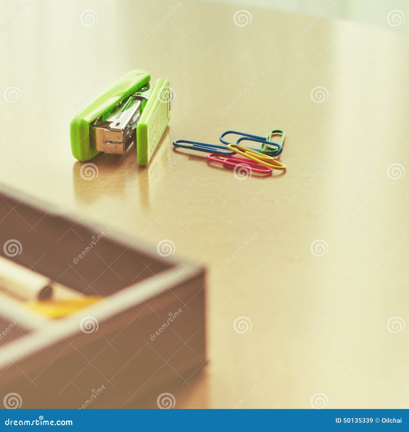 Green Stapler and Paper Clip Stock Image - Image of fastener, closeup ...