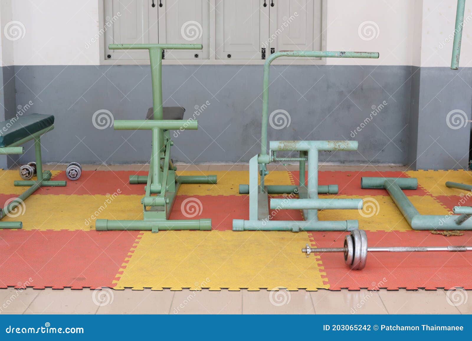 Green Steel Exercise Machine Inside Gym Room for Exercise. Stock Photo ...
