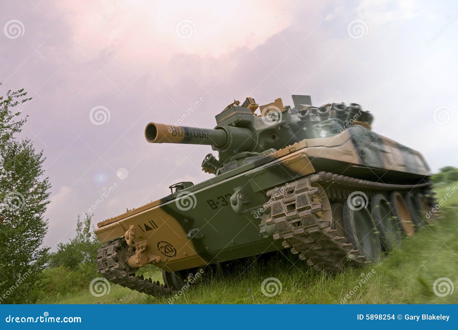 Green Tank in Purple Haze stock photo. Image of battle - 5898254