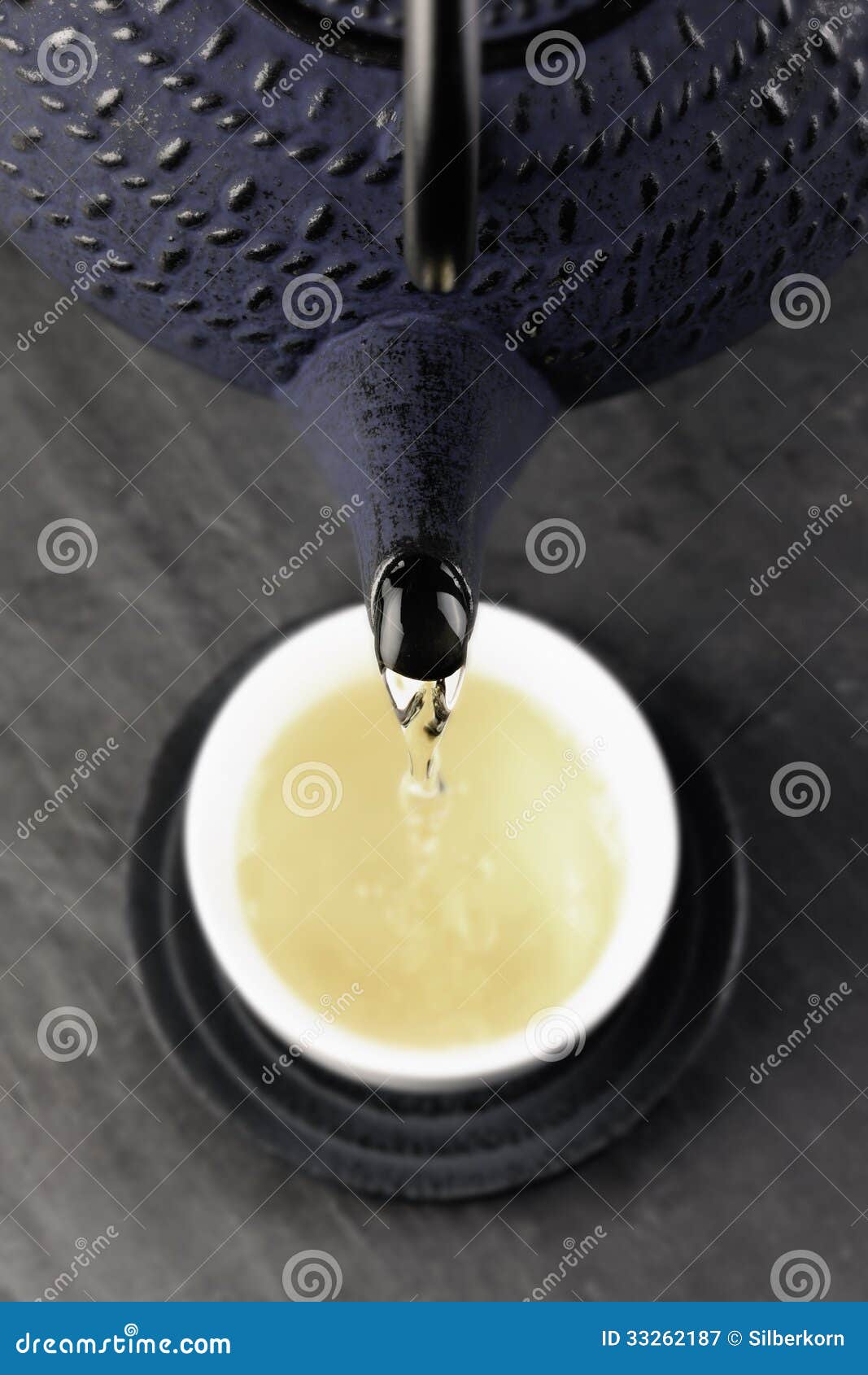 Green Tea Being Poured Out of a Japanese Teapot Stock Image - Image of ...