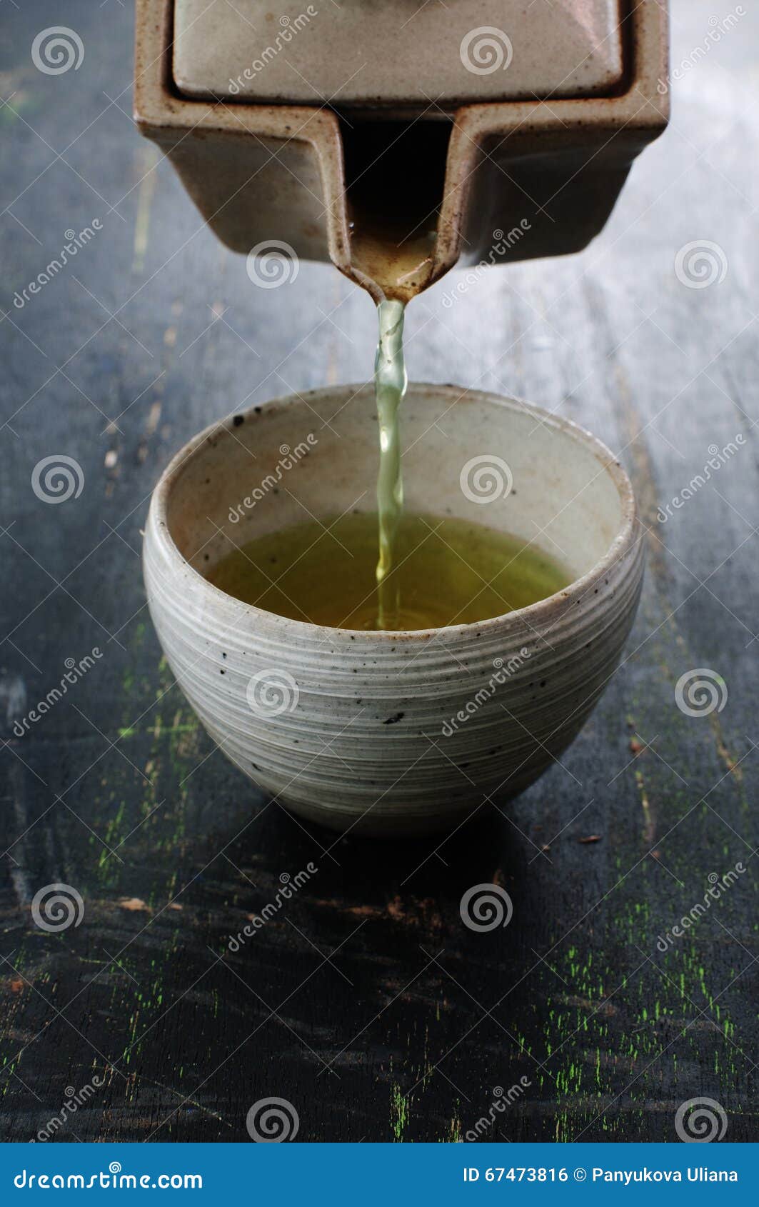 Green tea in a bowl stock photo. Image of sencha, liquid - 67473816