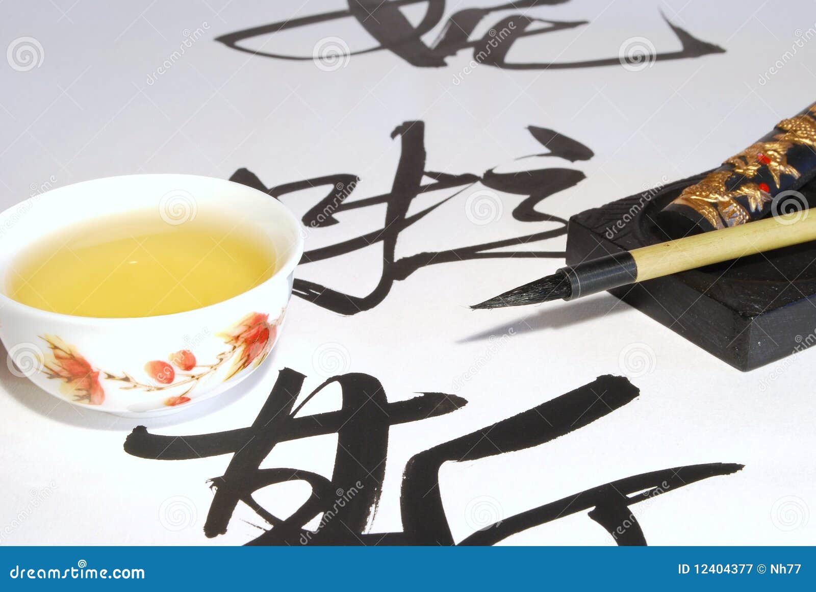 Green tea and calligraphy stock image. Image of isolated - 12404377