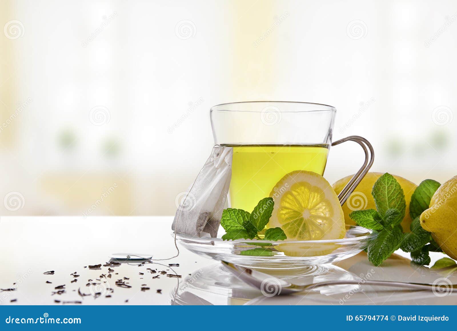 Green Tea with Mint and Lemon with Teabag Front View Stock Photo ...