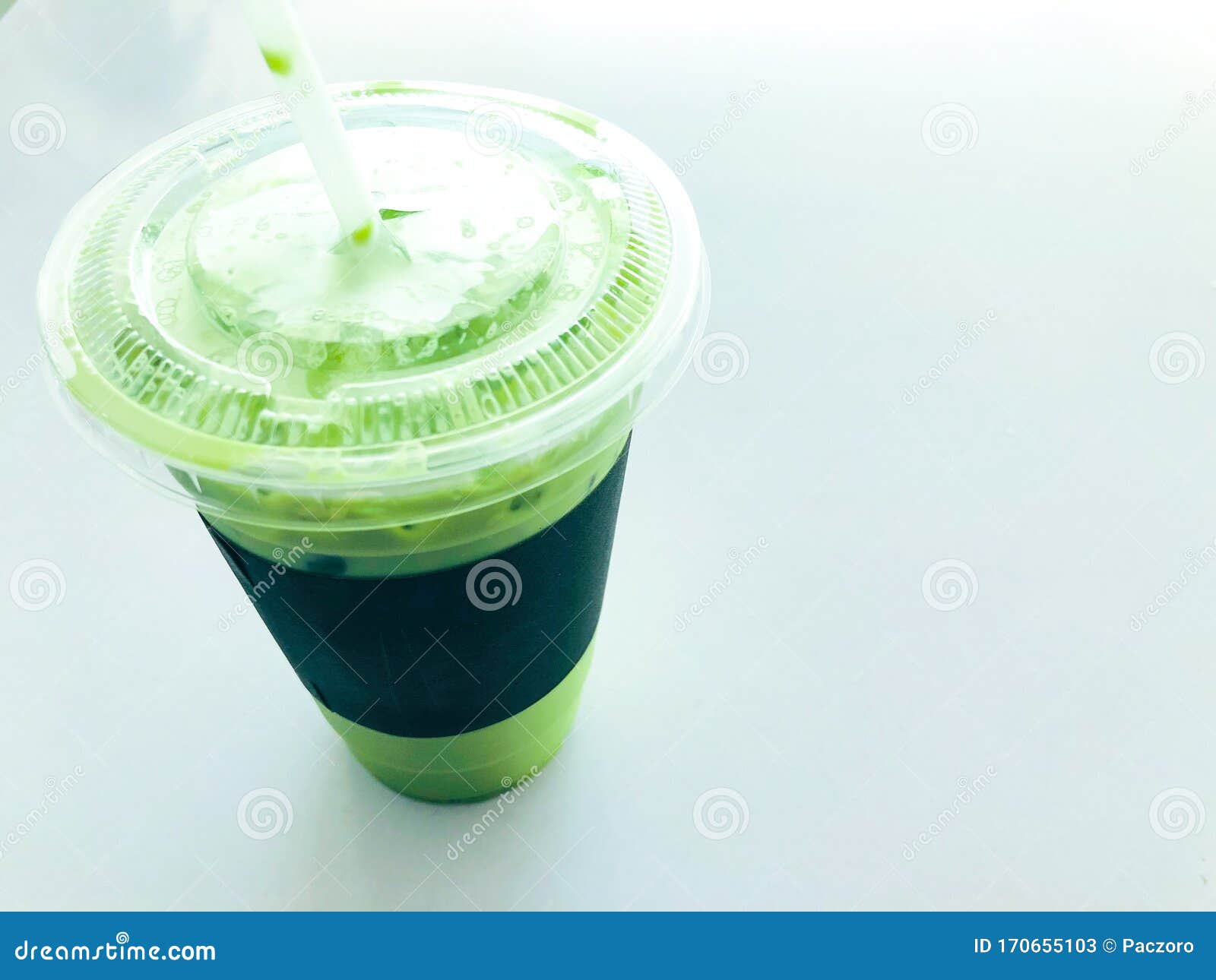 Green tea in a plastic cup stock image. Image of table - 170655103