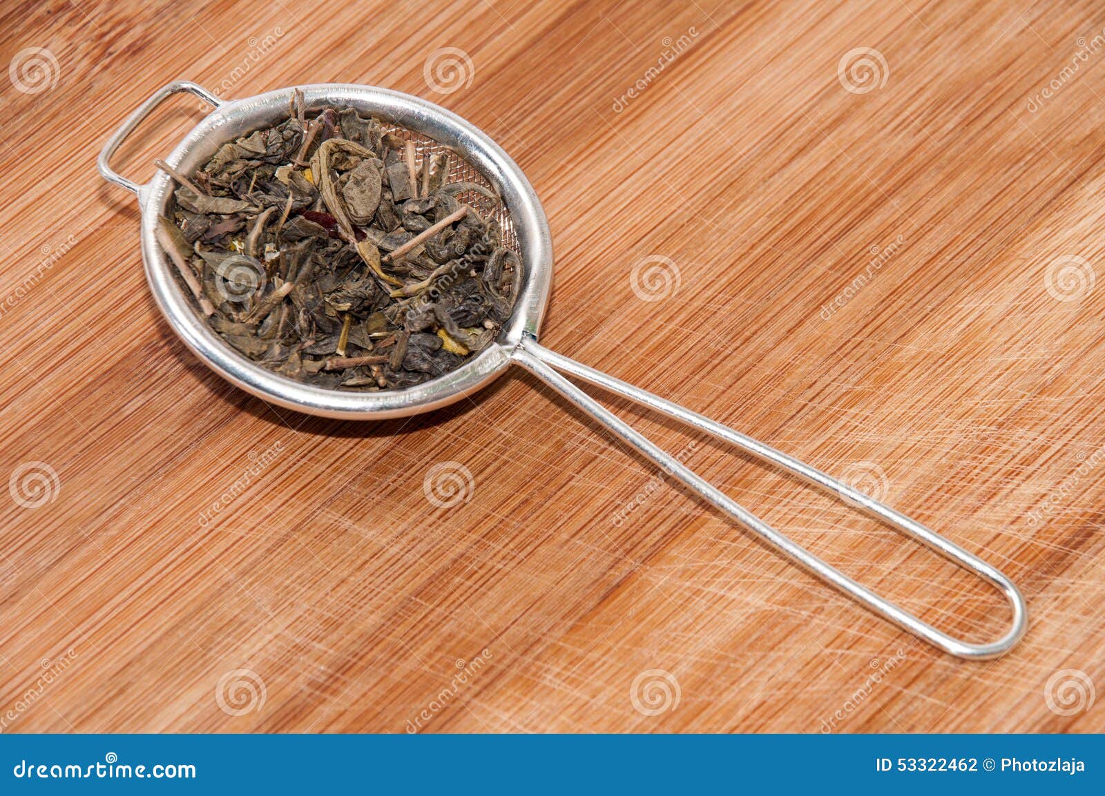 Green tea in tea strainer stock photo. Image of isolated - 53322462