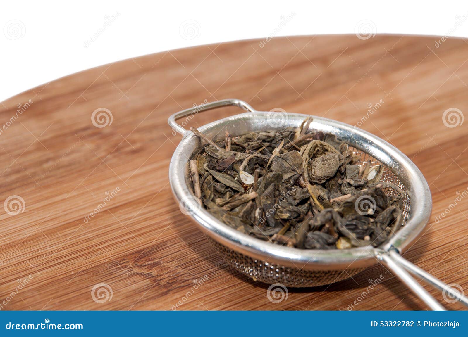Green tea in tea strainer stock photo. Image of herb - 53322782