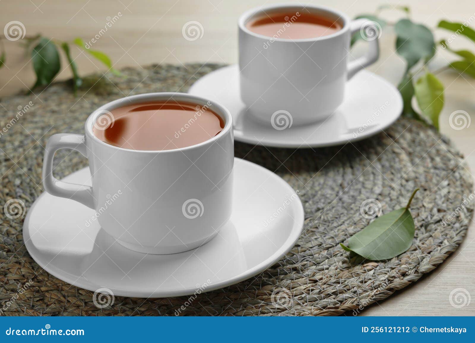 Green Tea in White Cups with Leaves on Table, Closeup Stock Photo ...