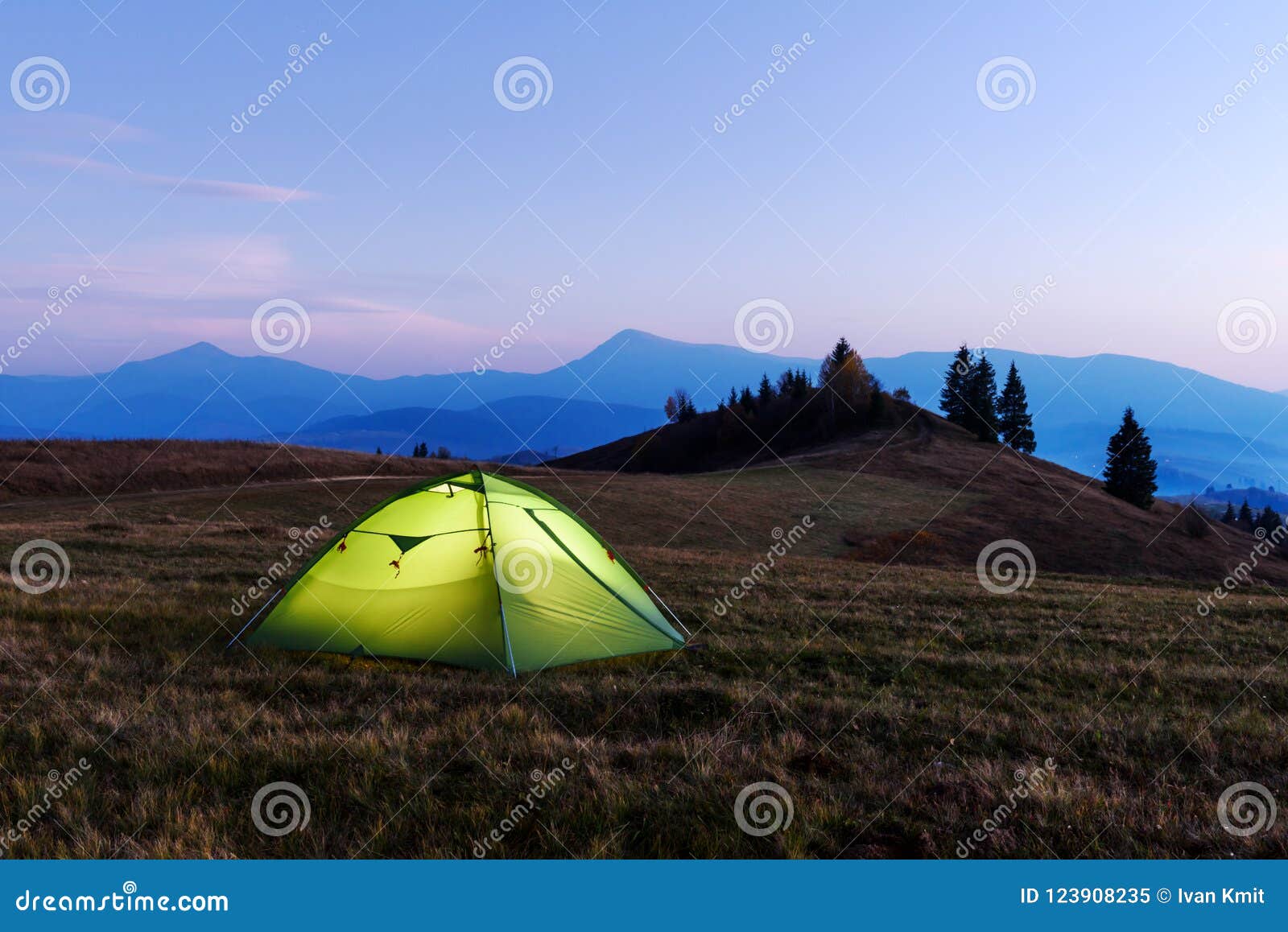 Green Tent Lighted from the Inside Stock Image - Image of high, cliff ...